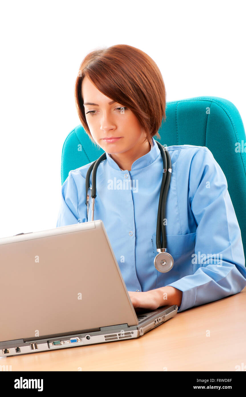 Young female doctor working at the computer Stock Photo - Alamy