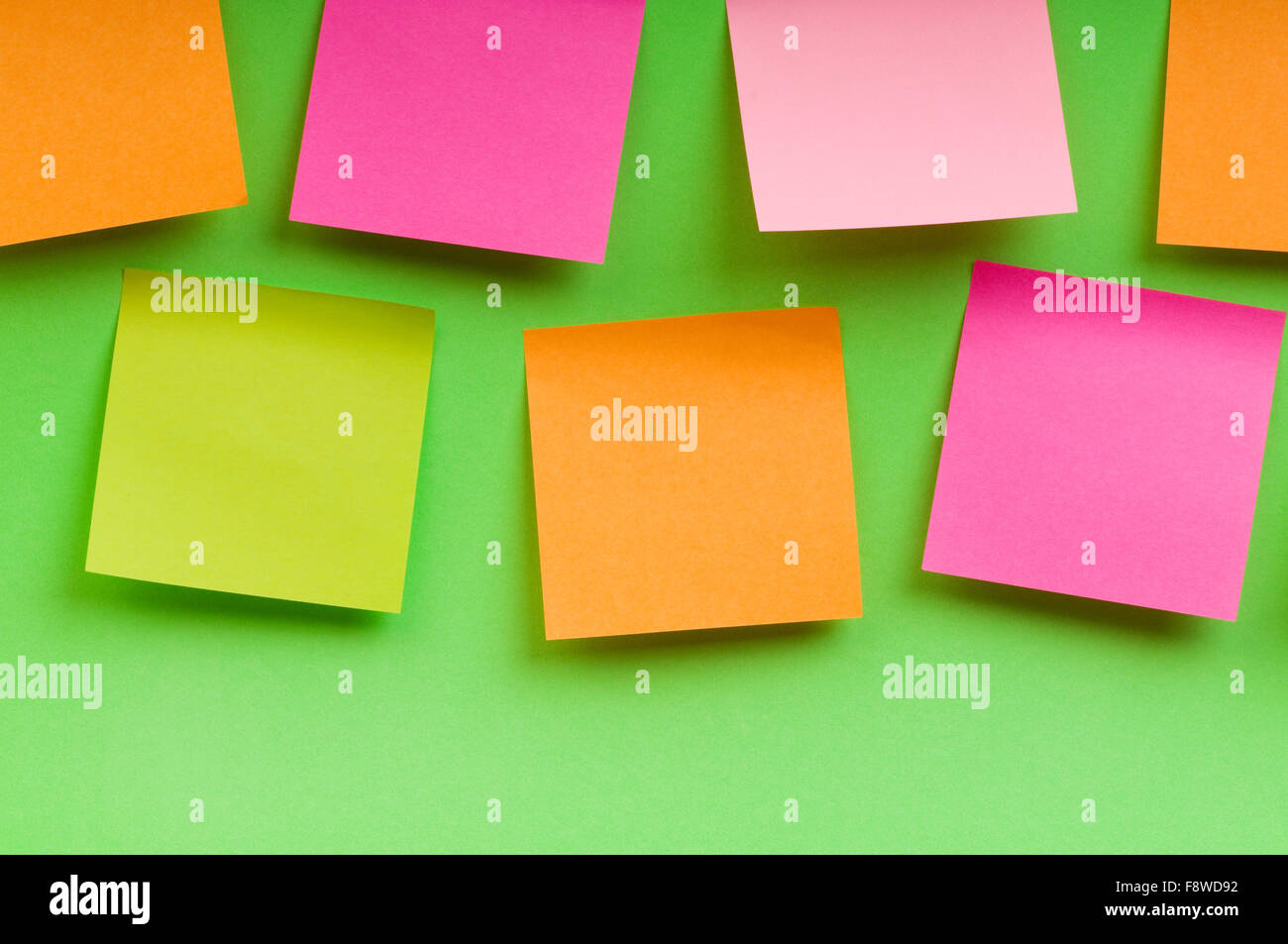 Reminder notes on the bright colorful paper Stock Photo - Alamy
