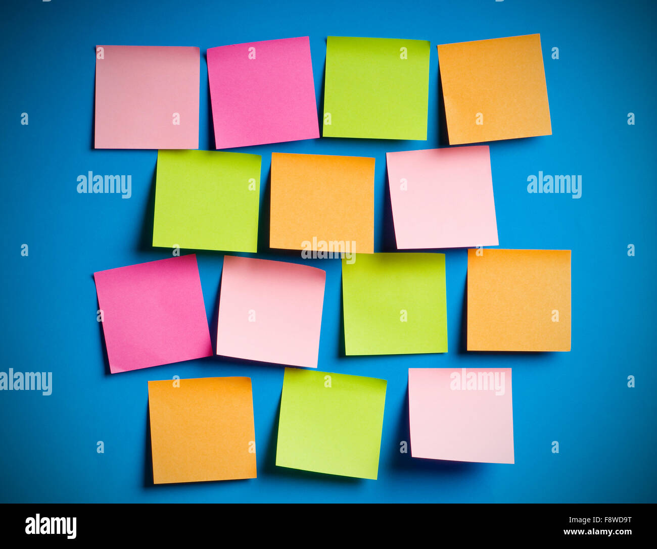 Reminder notes on the bright colorful paper Stock Photo - Alamy