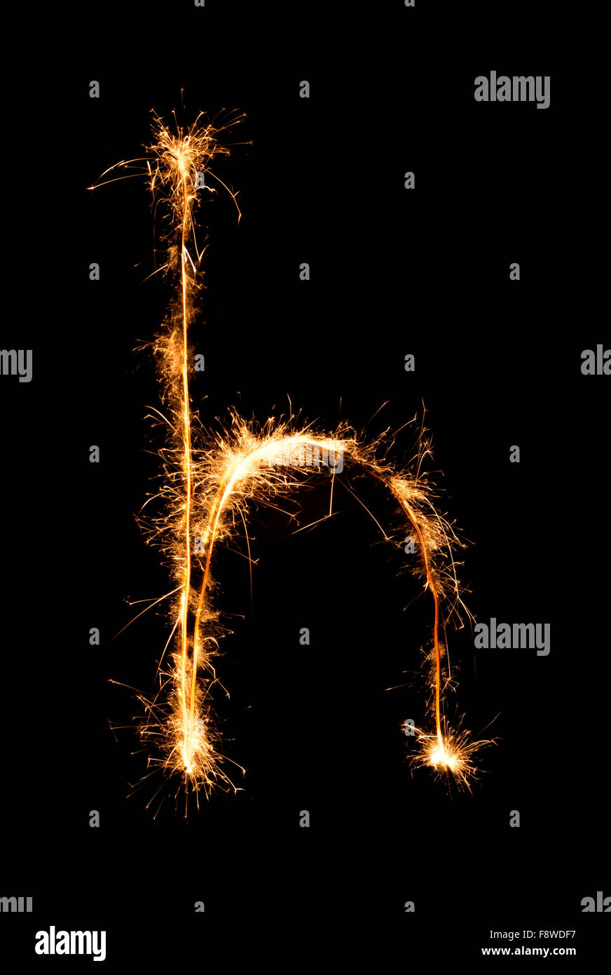Sparkler firework light alphabet h (Small Letters) at night background ...