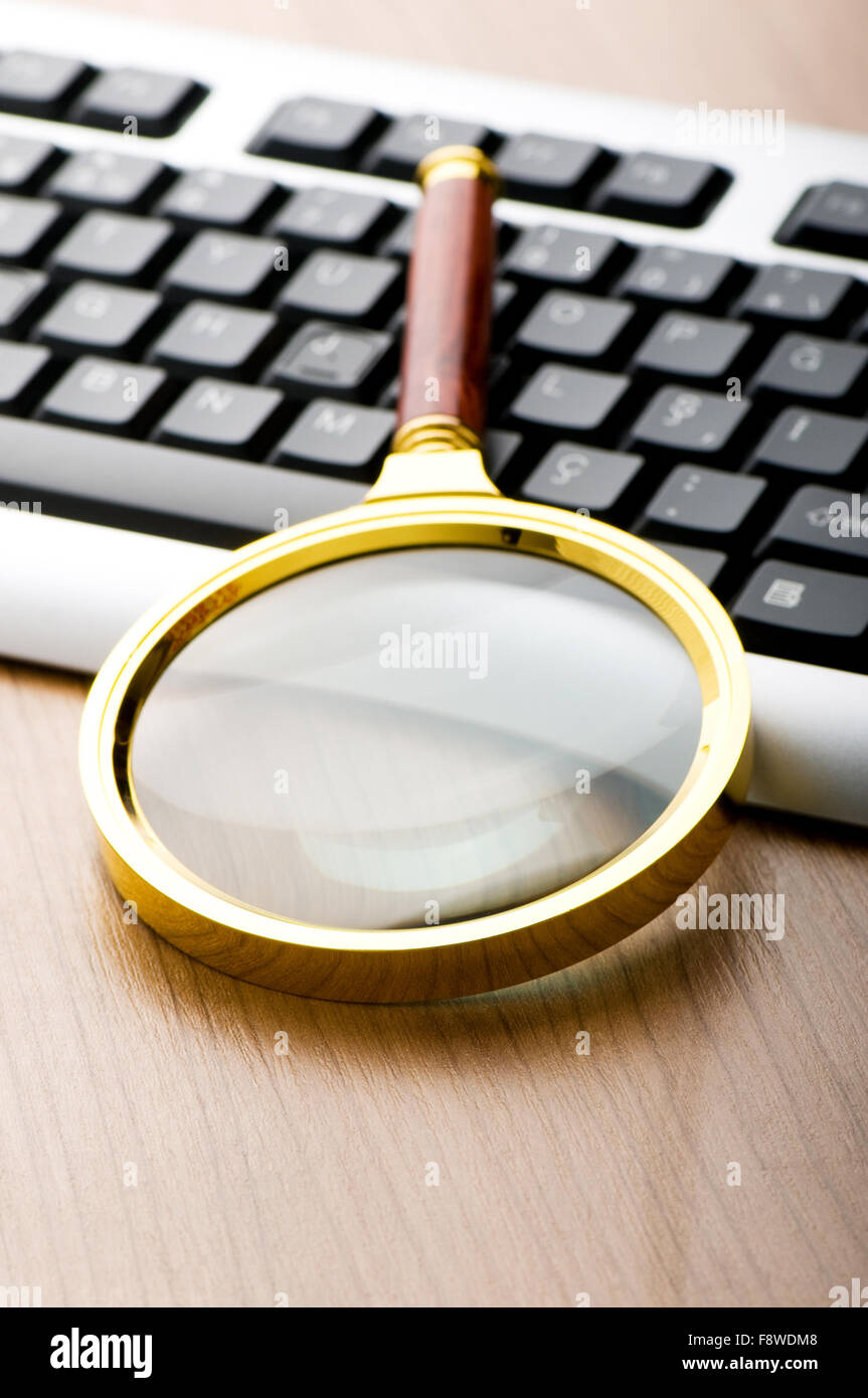 Computer security concept with keyboard and magnifying glass Stock ...