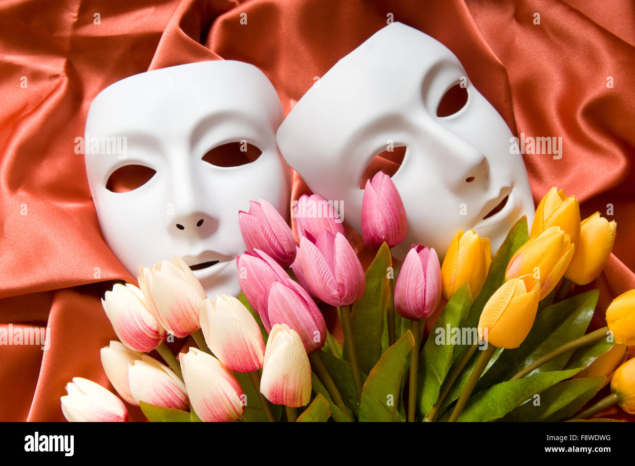 Theatre concept with the white plastic masks Stock Photo - Alamy