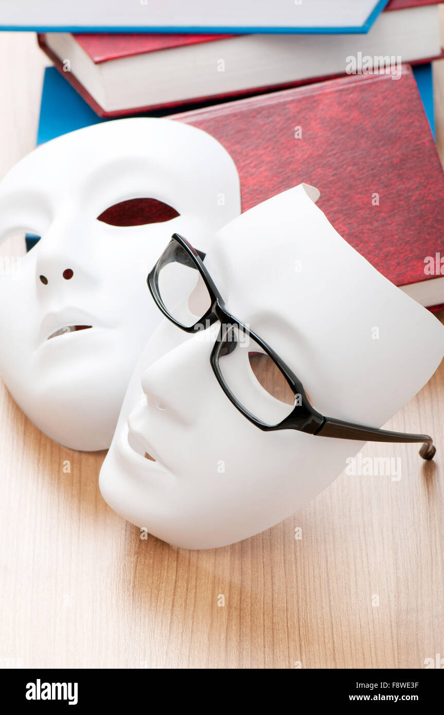 Reading concept with masks, books and glasses Stock Photo - Alamy
