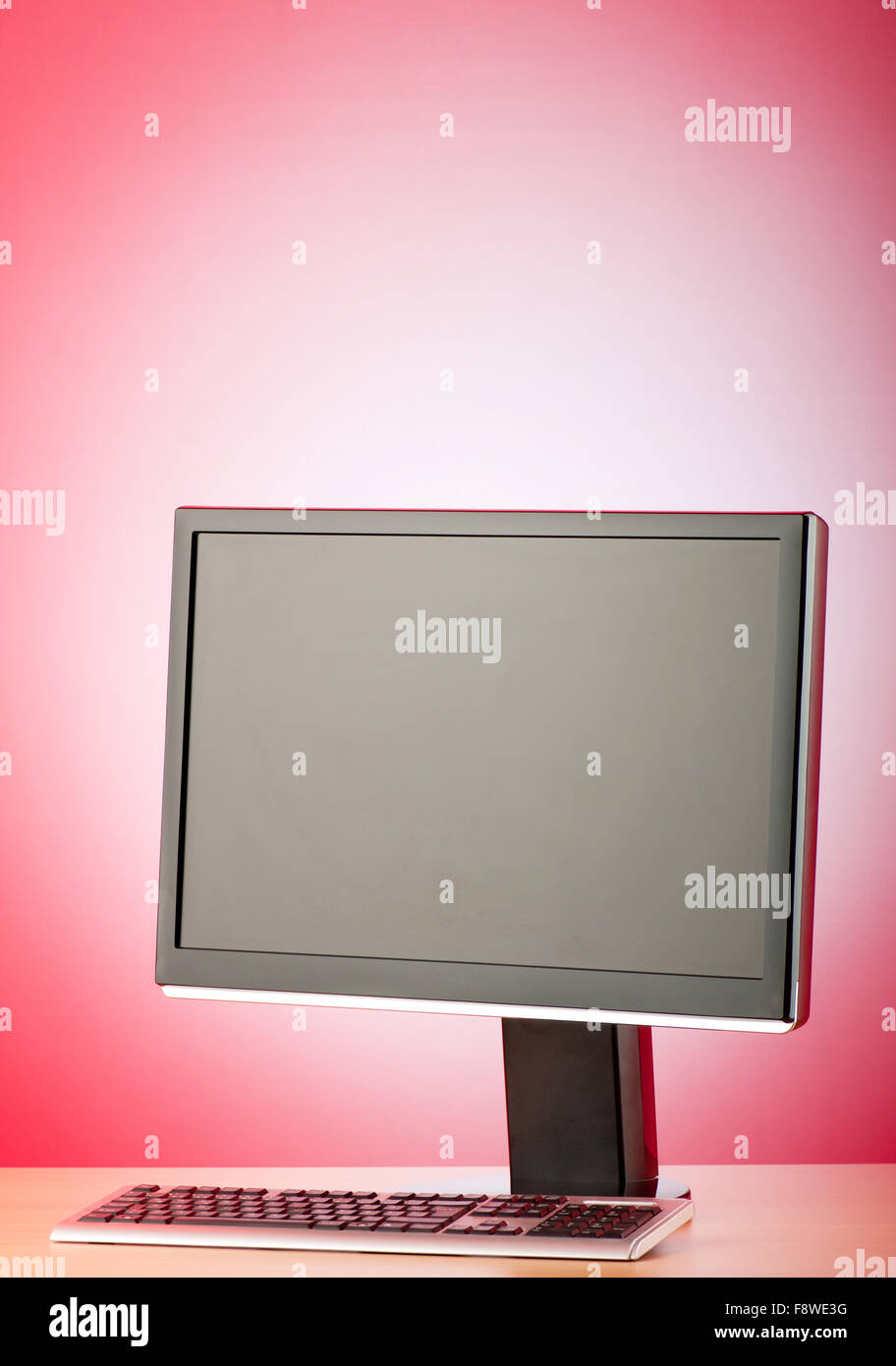 Wide screen computer monitor against colorful background Stock Photo ...