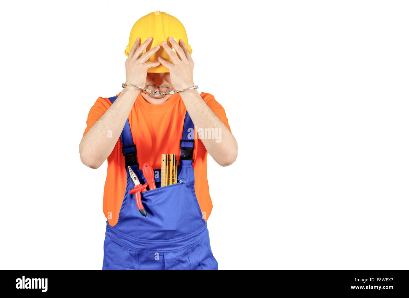 failure guilty laborer regretful criminal handcuffed hard hat blue ...
