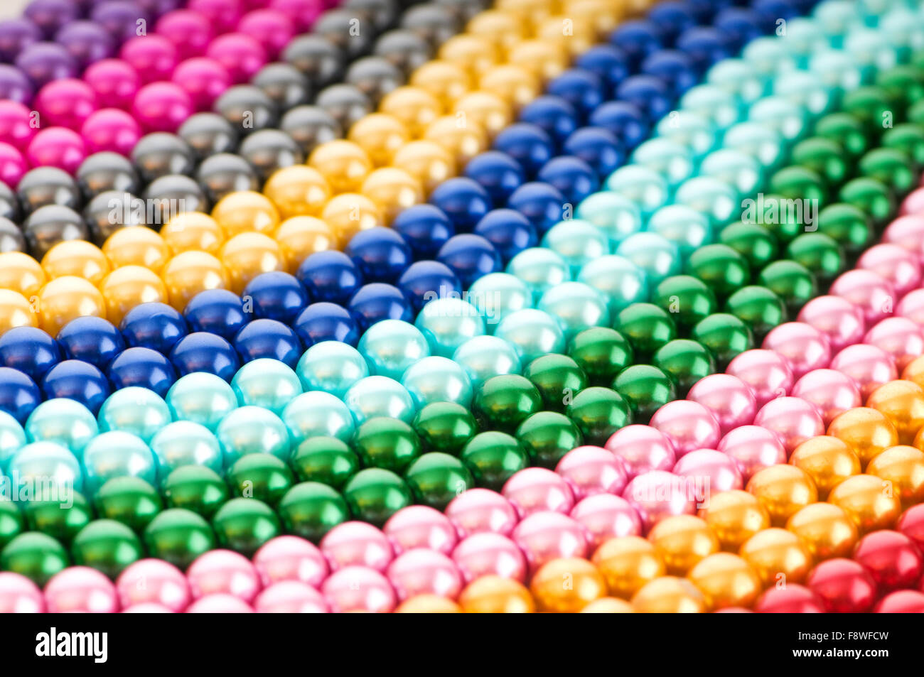 Abstract with colourful pearl necklaces Stock Photo - Alamy