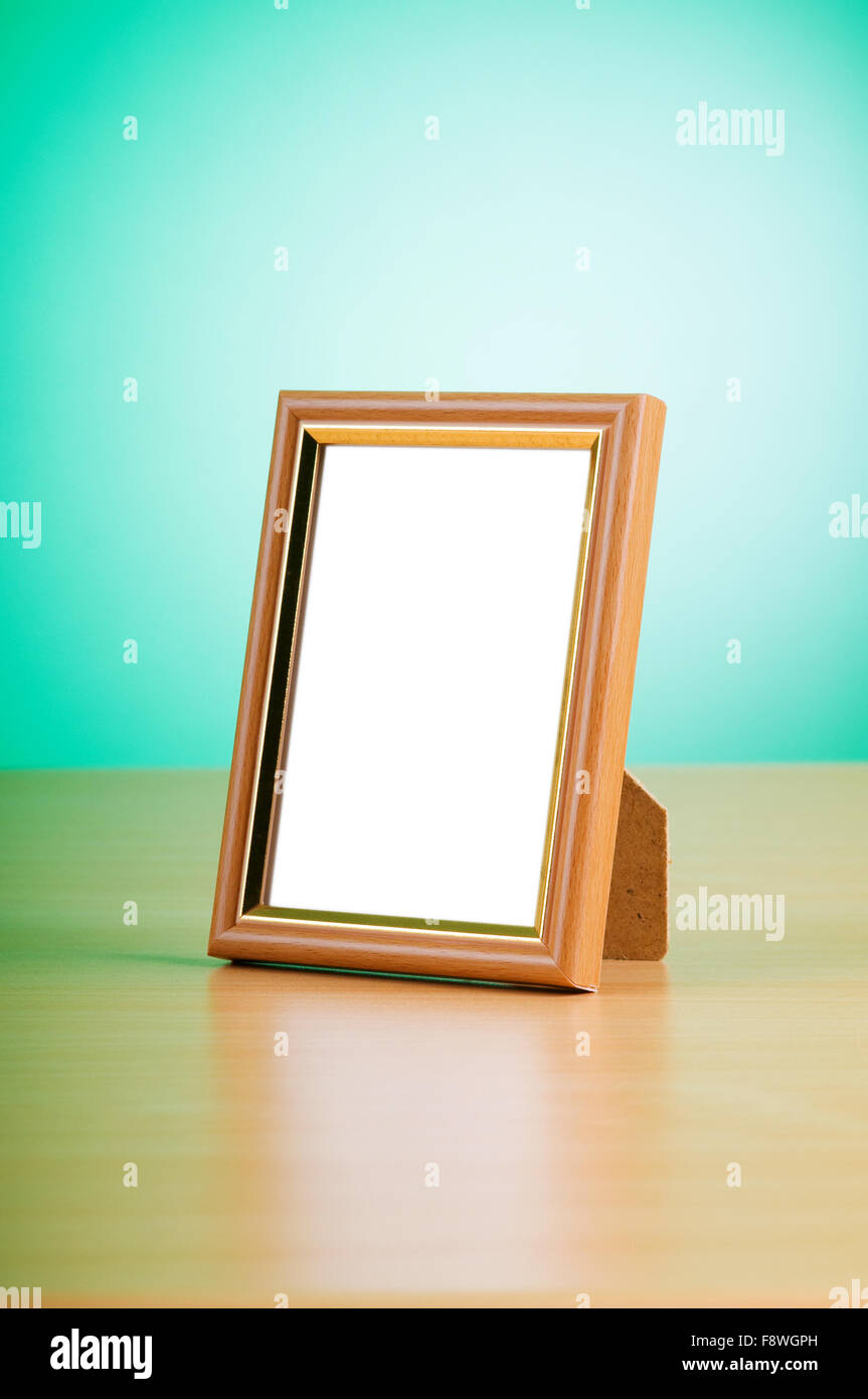 Wooden picture frames on the gradient background Stock Photo - Alamy