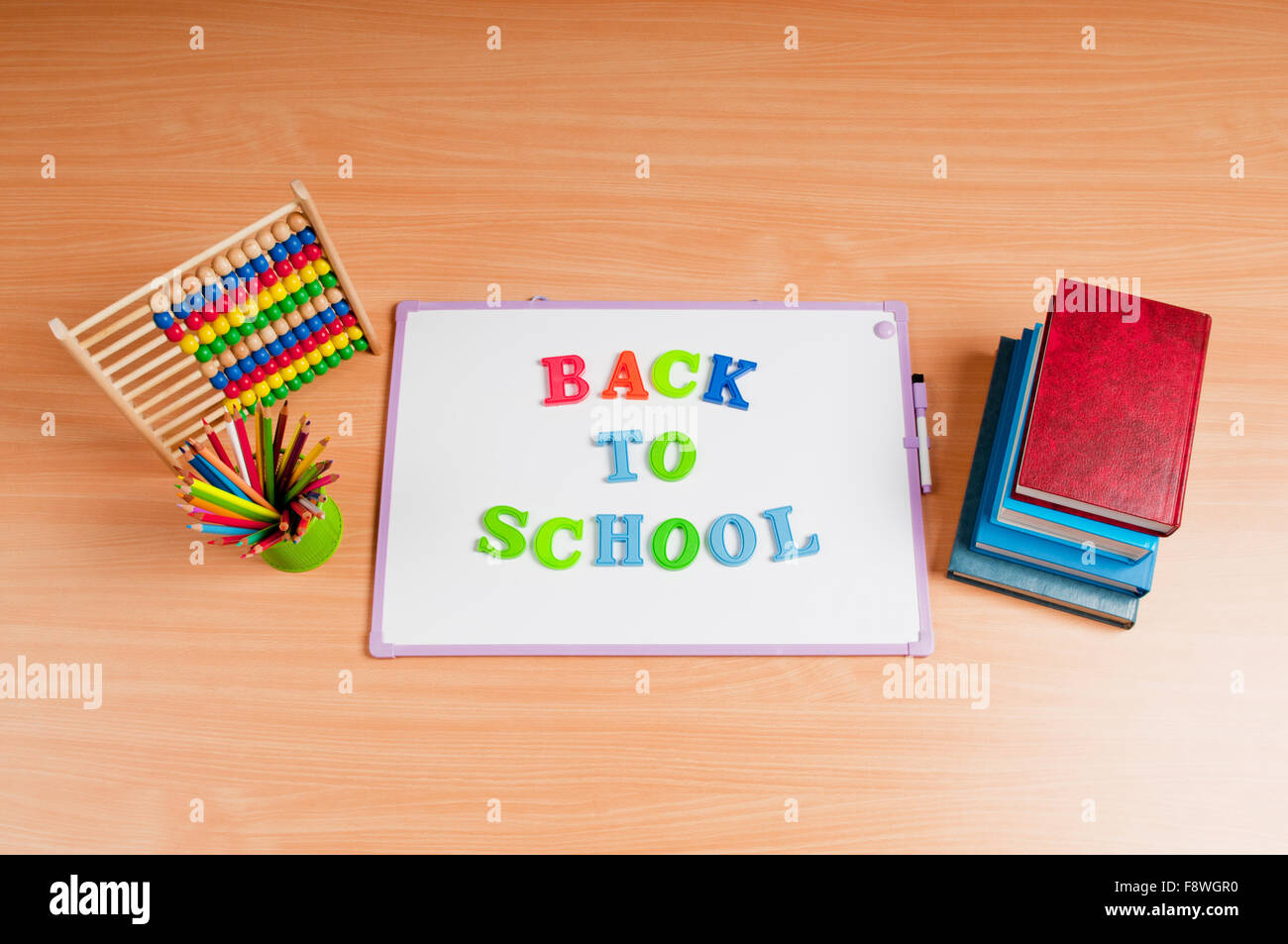 School items on the desk Stock Photo - Alamy