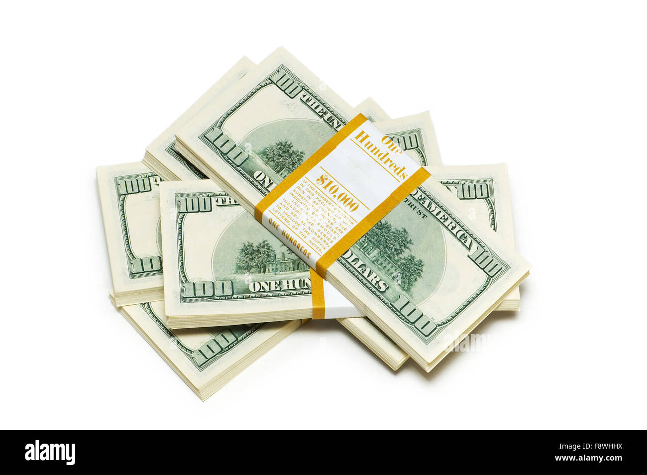 Ten thousand dollar stacks on the white Stock Photo - Alamy