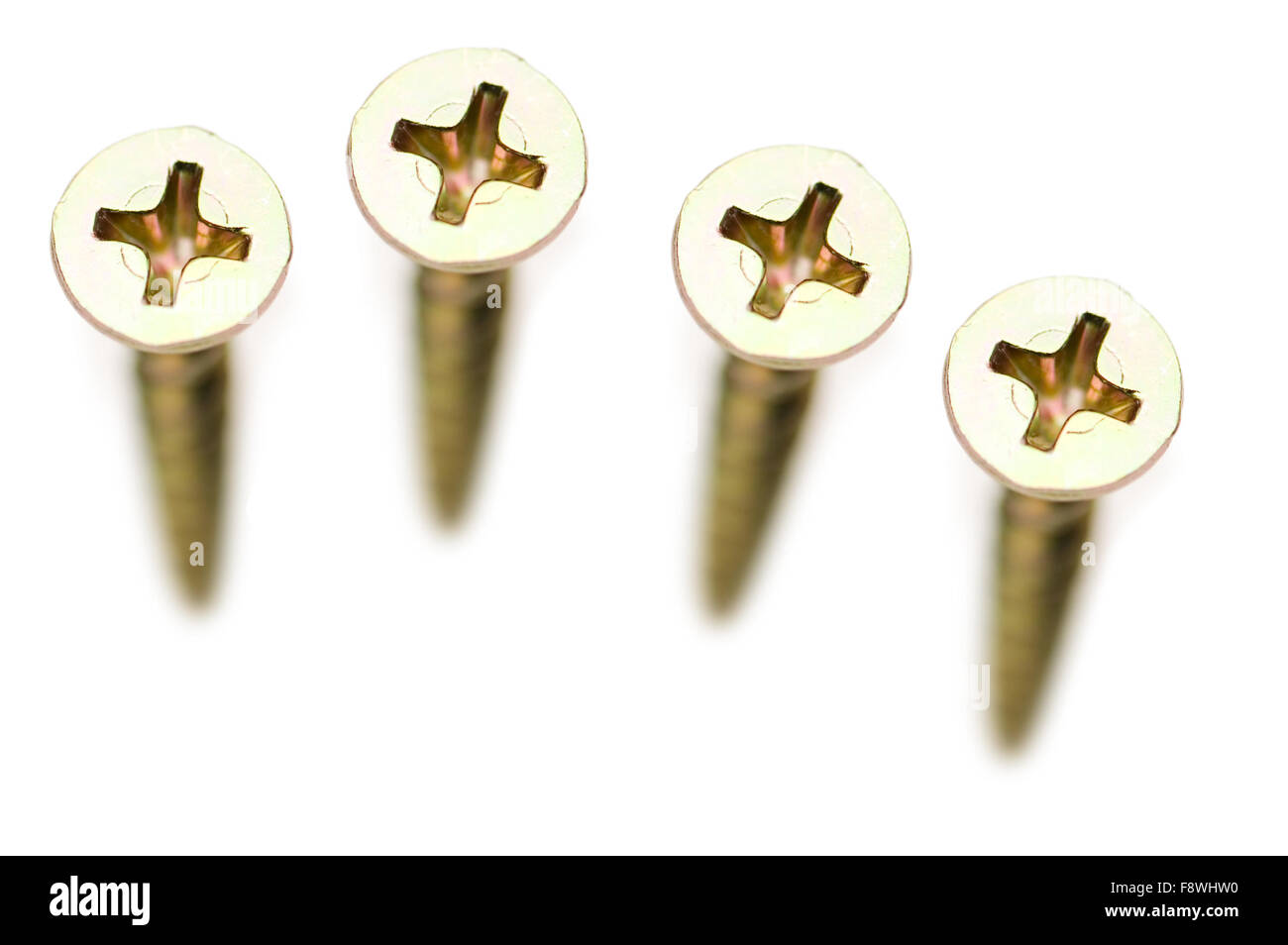 Four screws isolated on the white background Stock Photo - Alamy