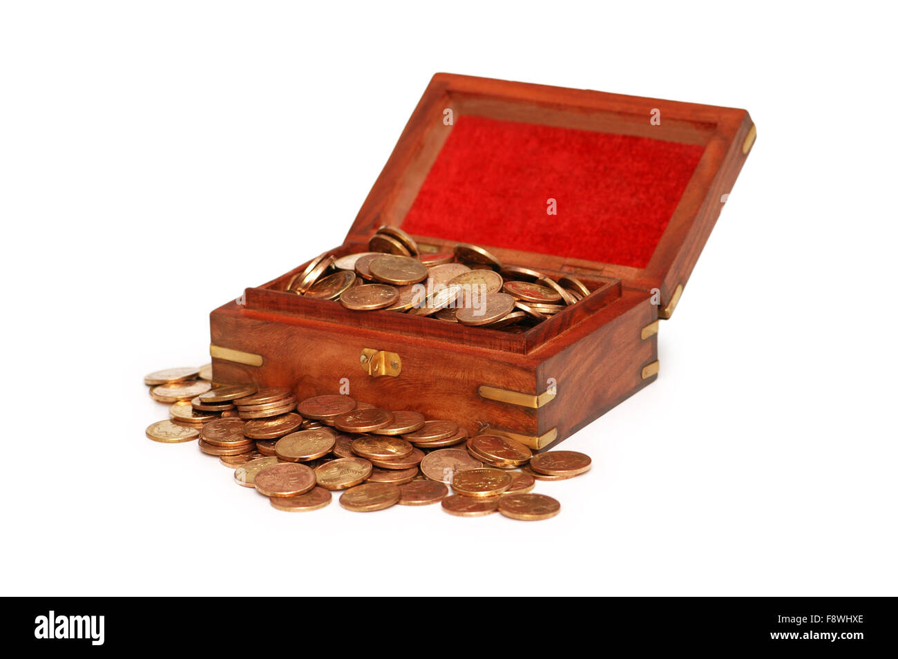 Small chest full of coins isolated on white Stock Photo - Alamy