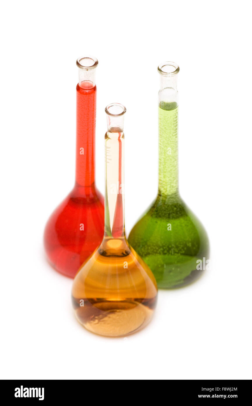 Three tubes with chemicals isolated on white Stock Photo - Alamy