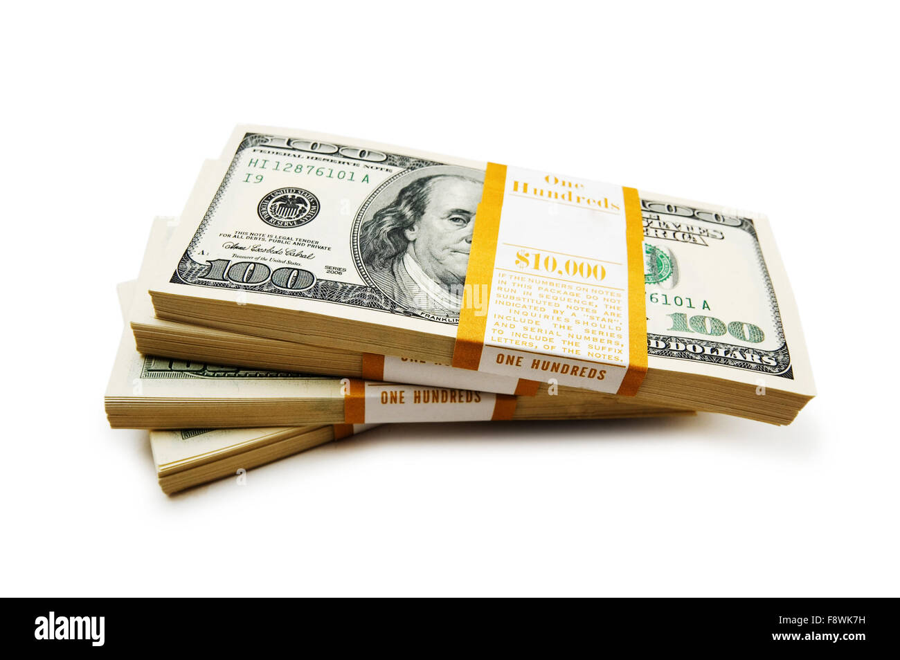 Ten thousand dollar stacks on the white Stock Photo - Alamy