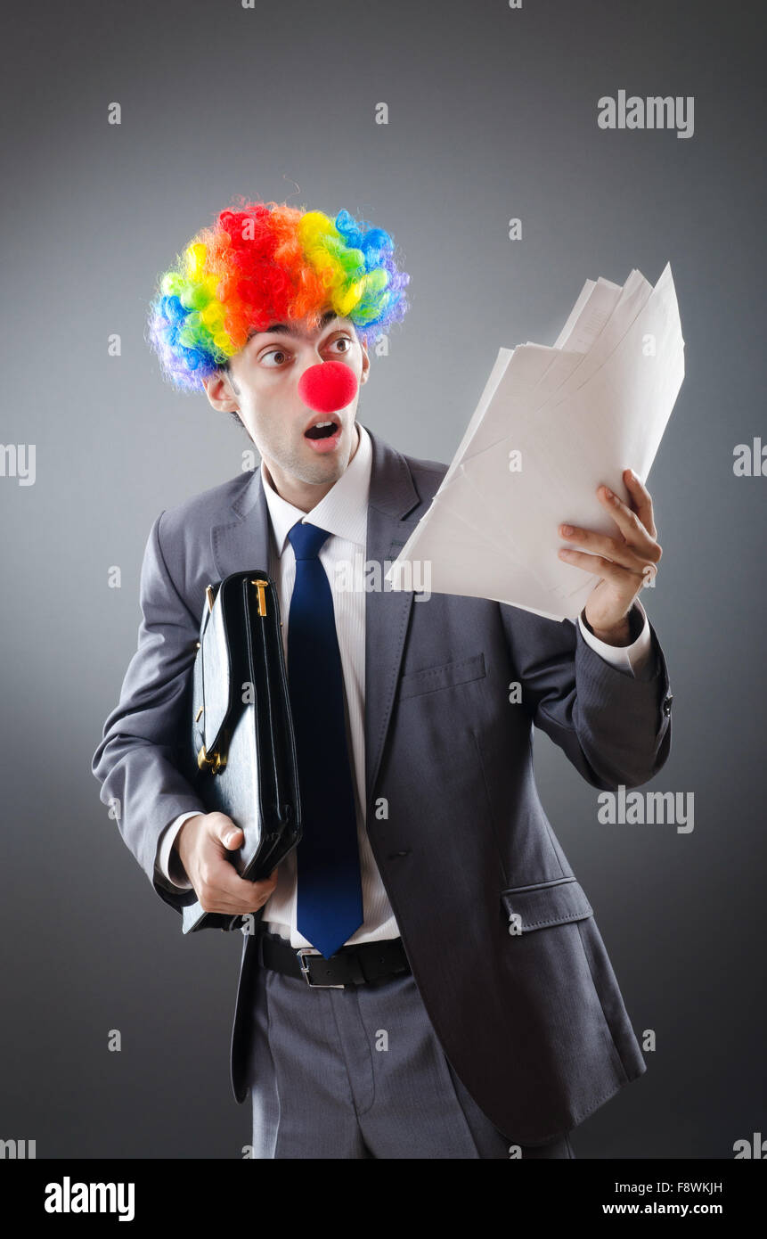 Clown businessman in funny business concept Stock Photo - Alamy