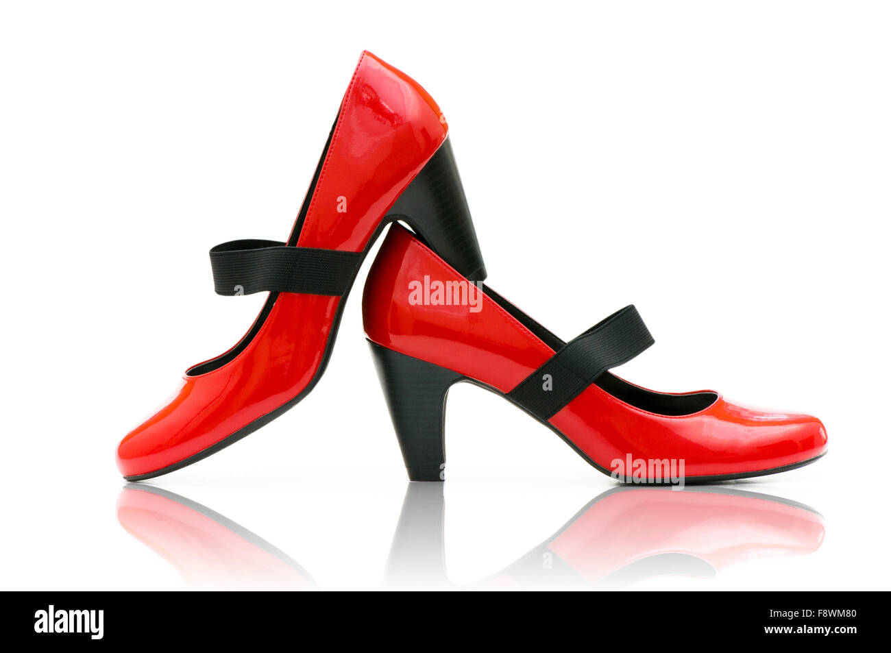 Elegant red shoes on the white Stock Photo - Alamy