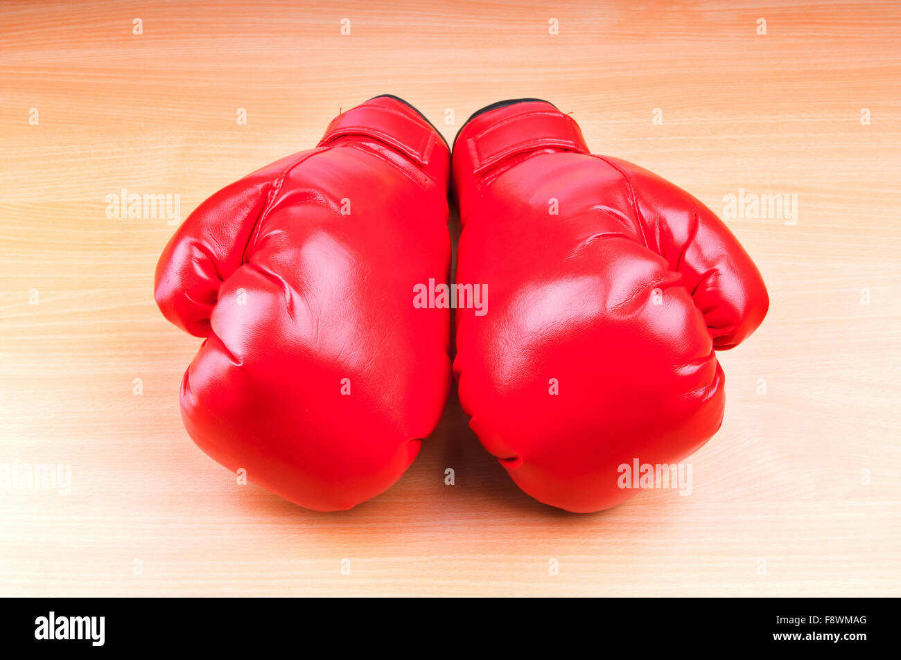 Boxing gloves on the table Stock Photo - Alamy