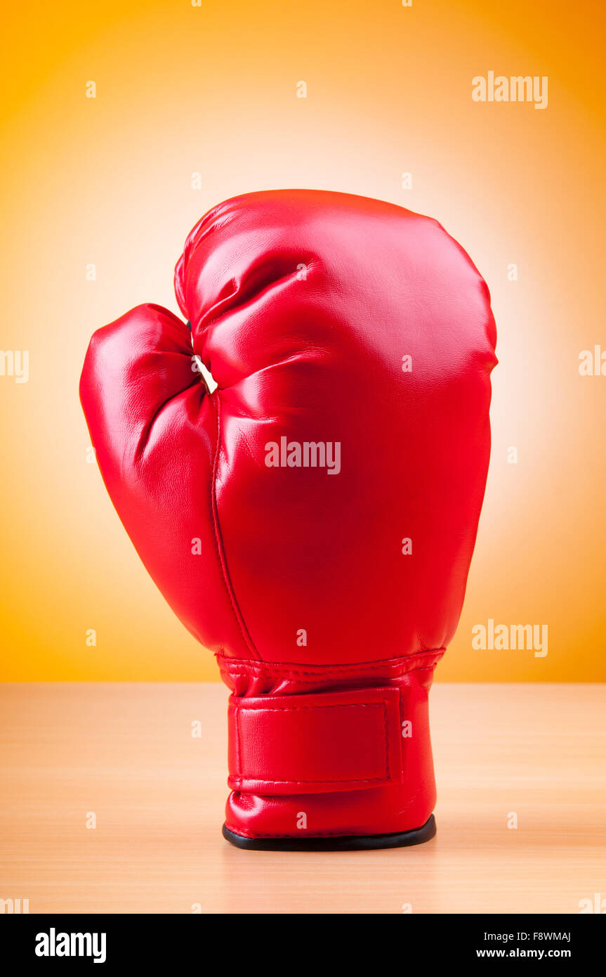 Boxing gloves on the table Stock Photo - Alamy