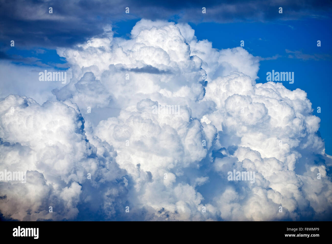 big thunder cloud and blue sky Stock Photo - Alamy