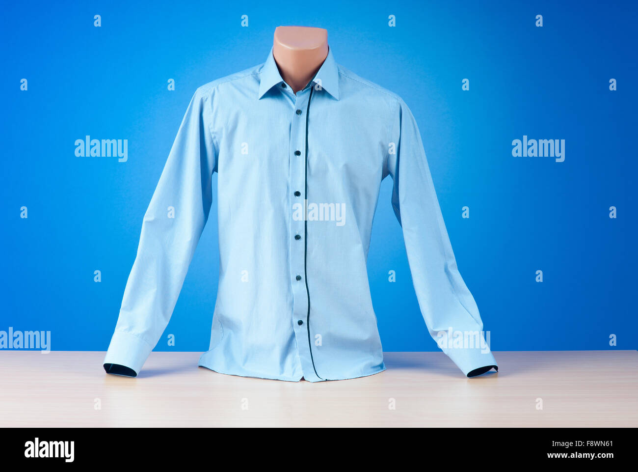 Shirt hanging on the hanger Stock Photo - Alamy