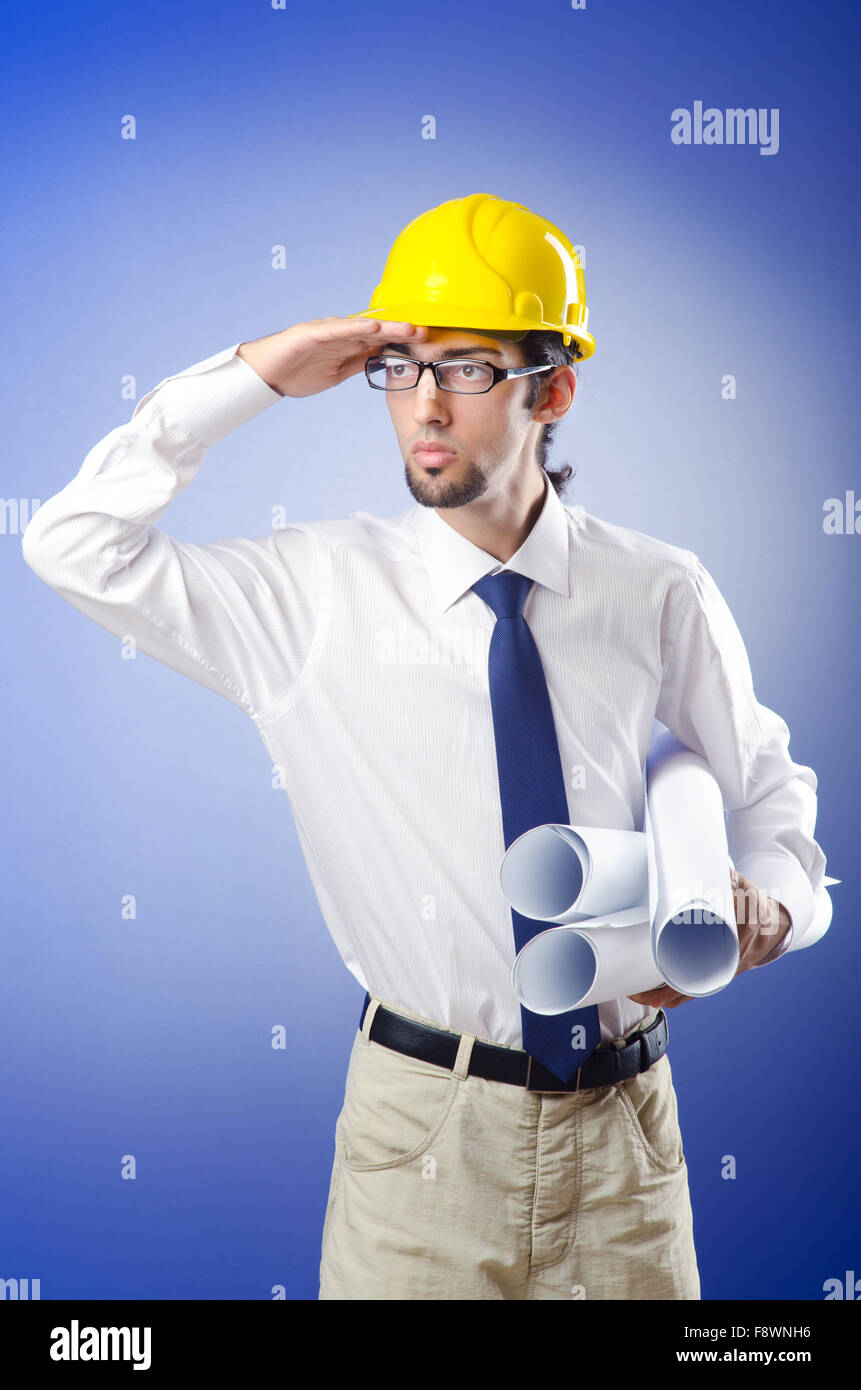 Young engineer working with drawings Stock Photo - Alamy