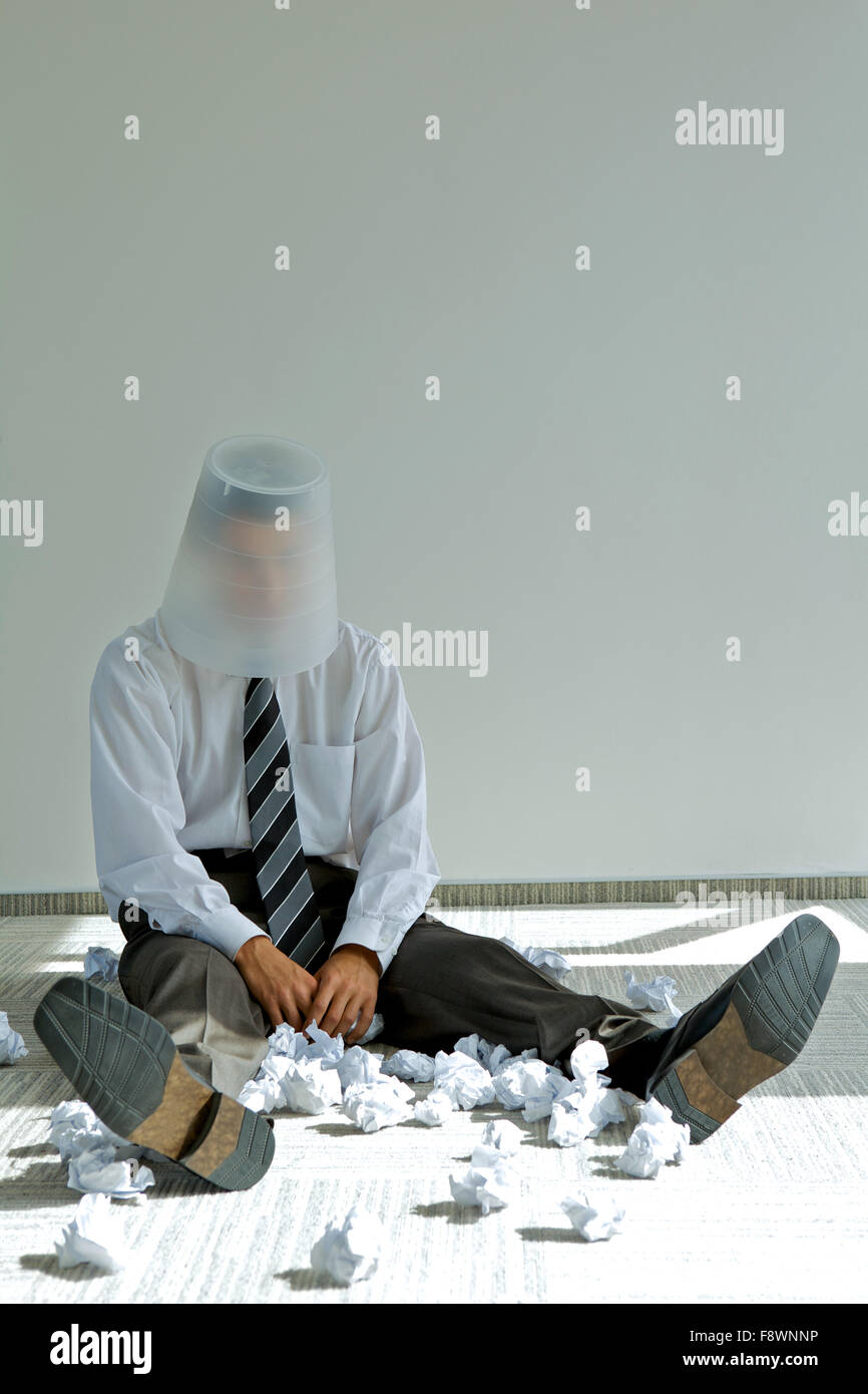 Business man bin on head hi-res stock photography and images - Alamy