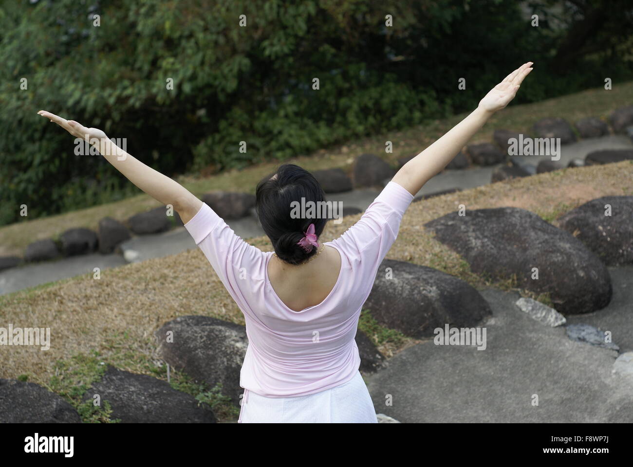 Lady spreading arms in hi-res stock photography and images - Alamy