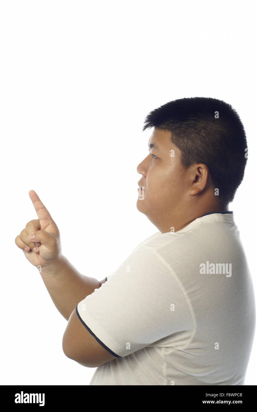 Fat asian man point to side Stock Photo - Alamy