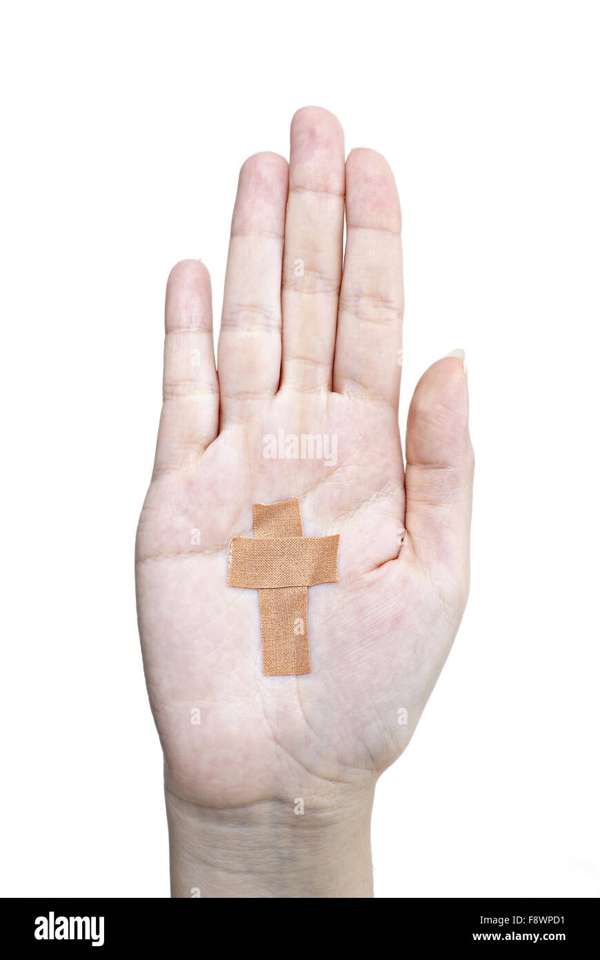 Female hand with plaster cross on white background Stock Photo - Alamy