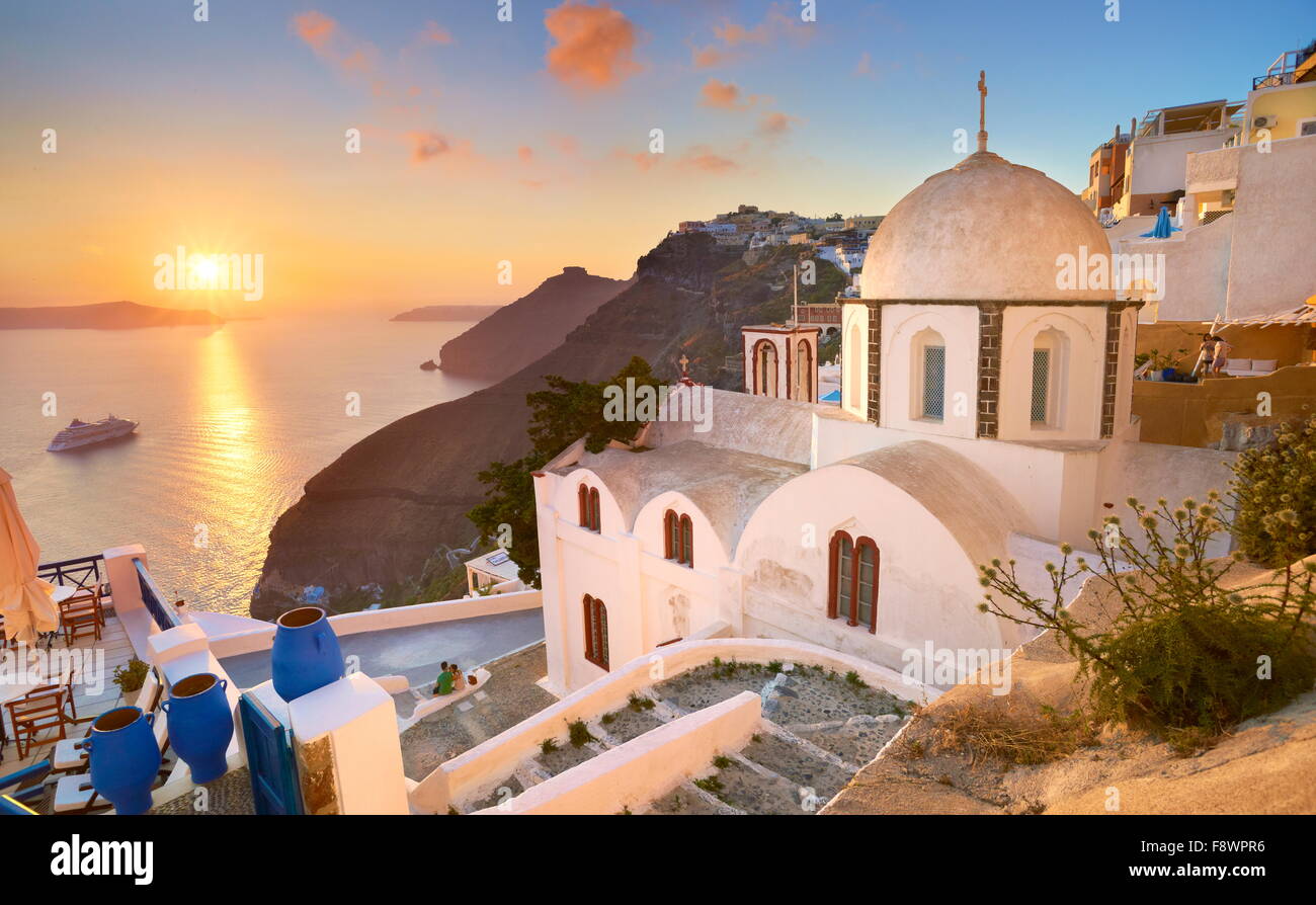 Thira (capital city of Santorini) - landscape with greek white church ...
