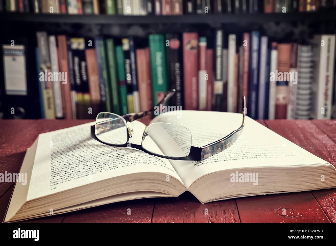 Open book with glasses hi-res stock photography and images - Alamy