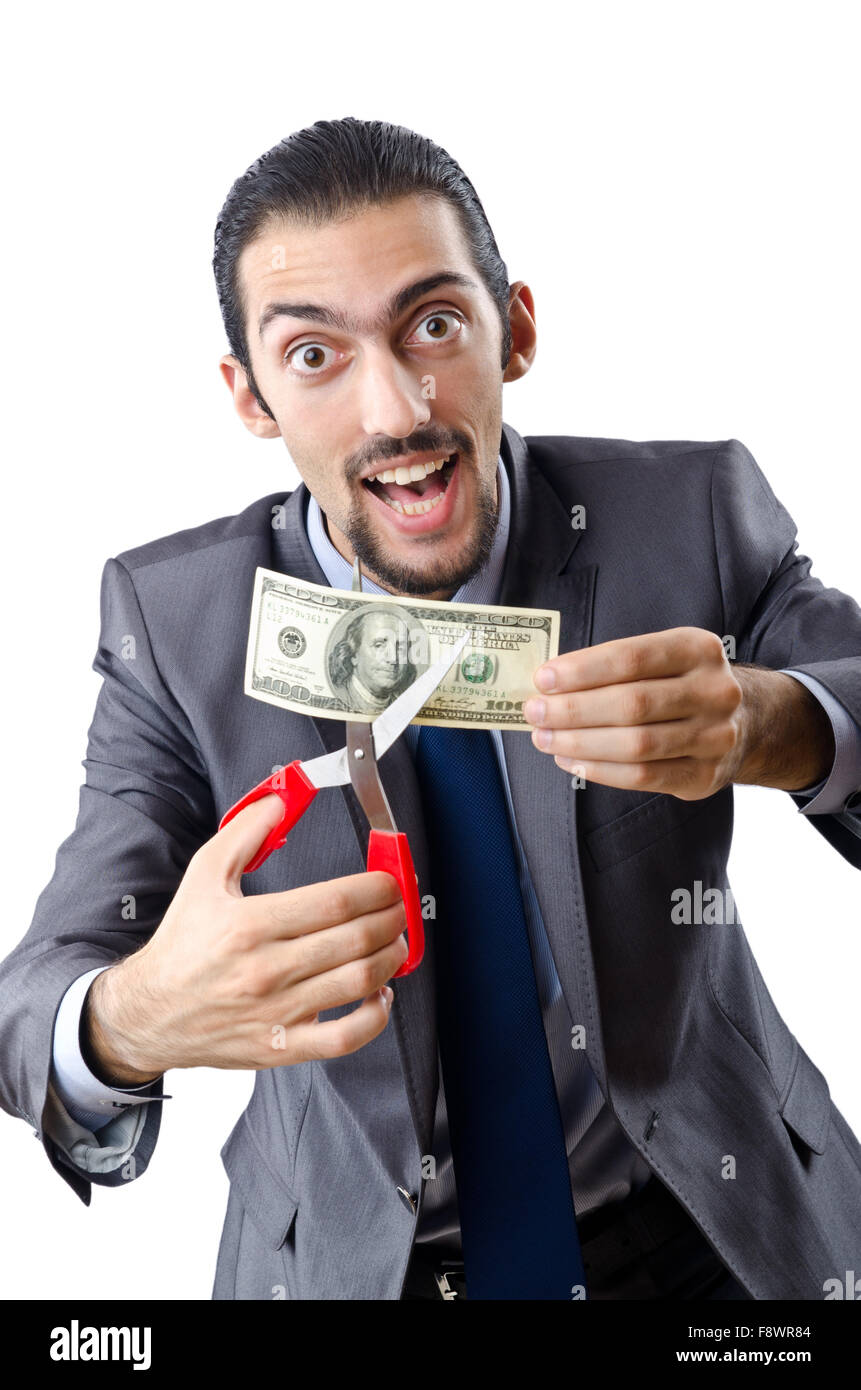 Man cutting money on white Stock Photo - Alamy
