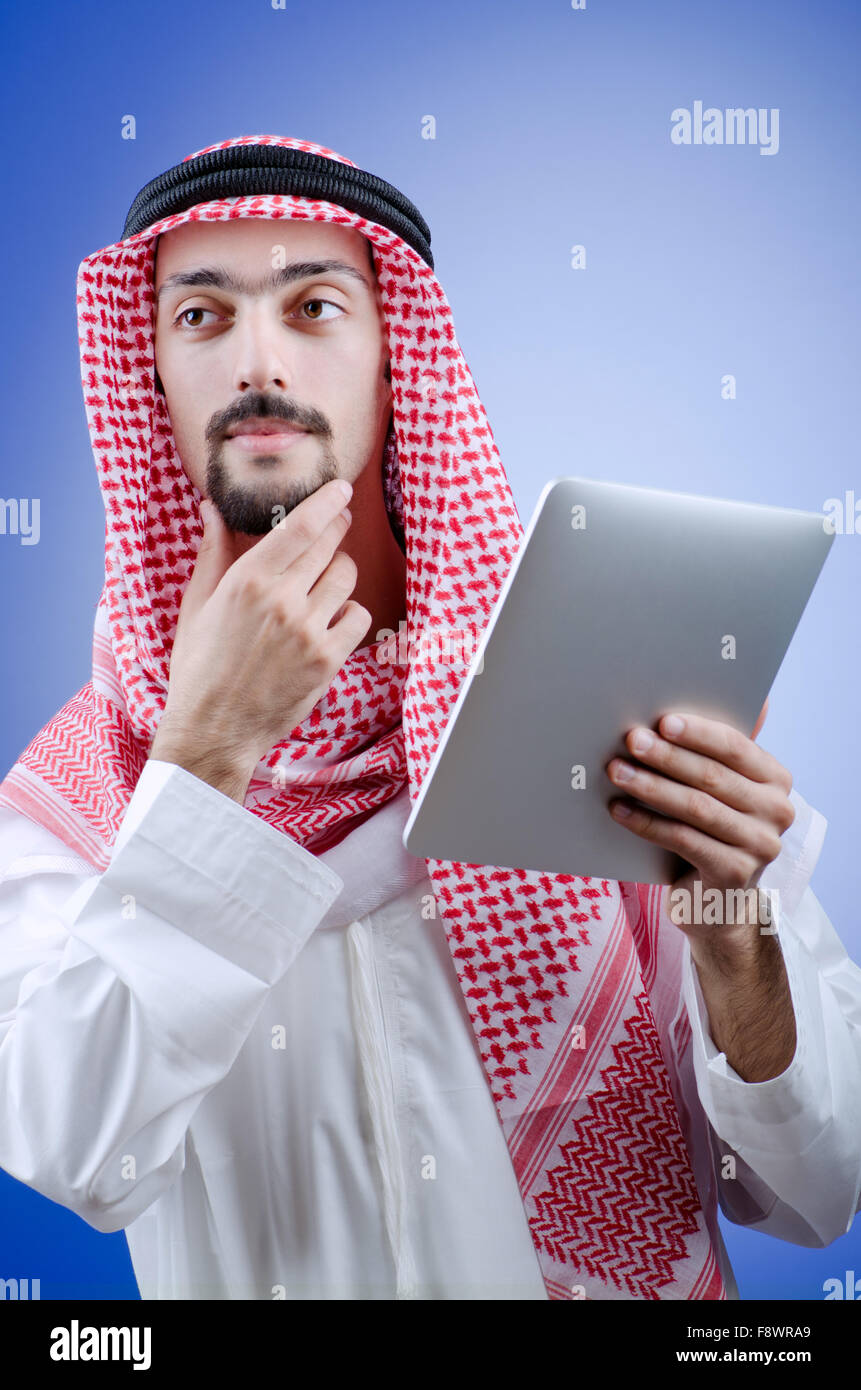 Young arab with tablet computer Stock Photo - Alamy
