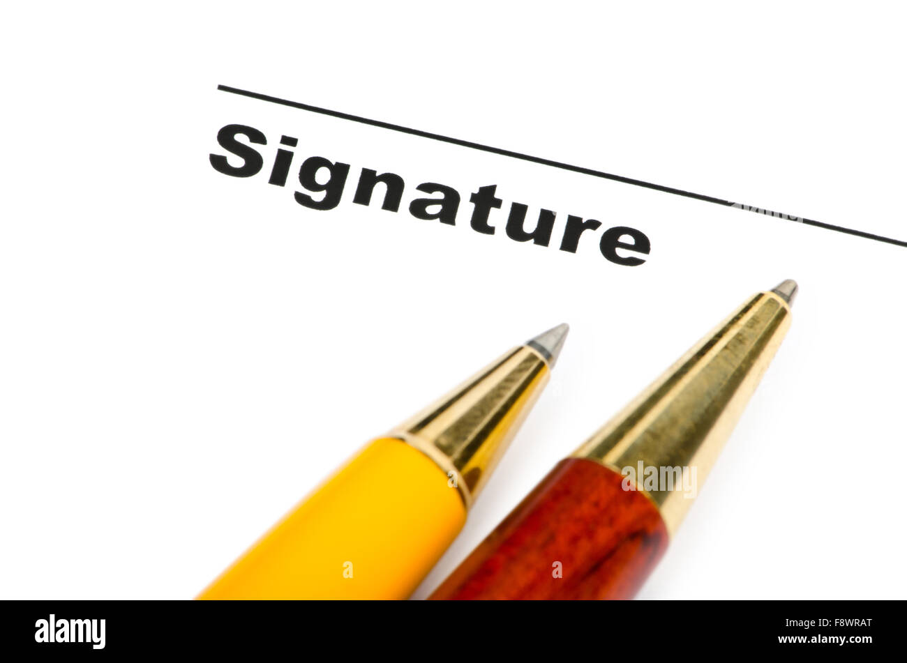 Pen and signature isolated on white Stock Photo - Alamy