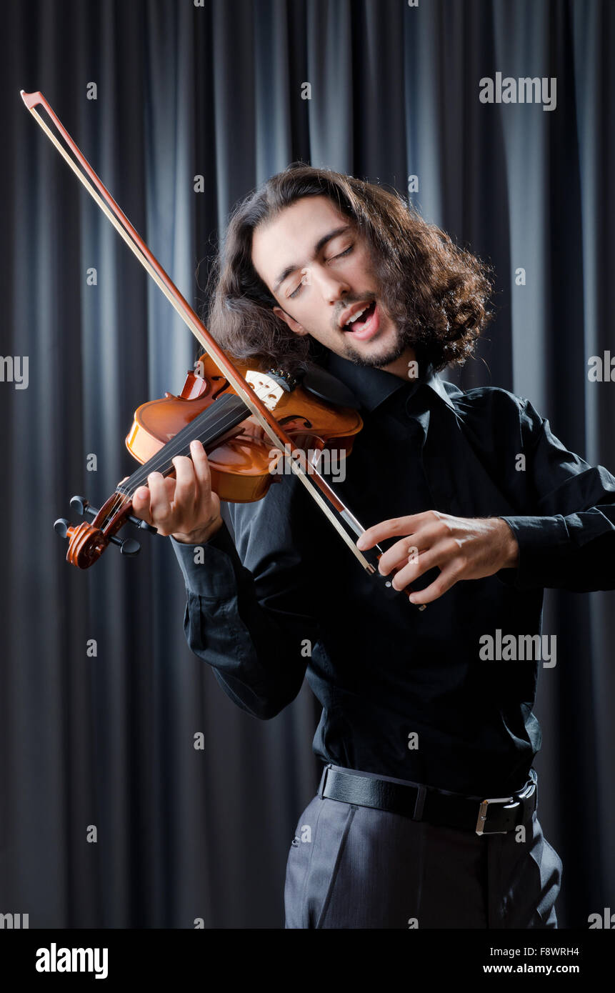 Violin player playing the intstrument Stock Photo - Alamy