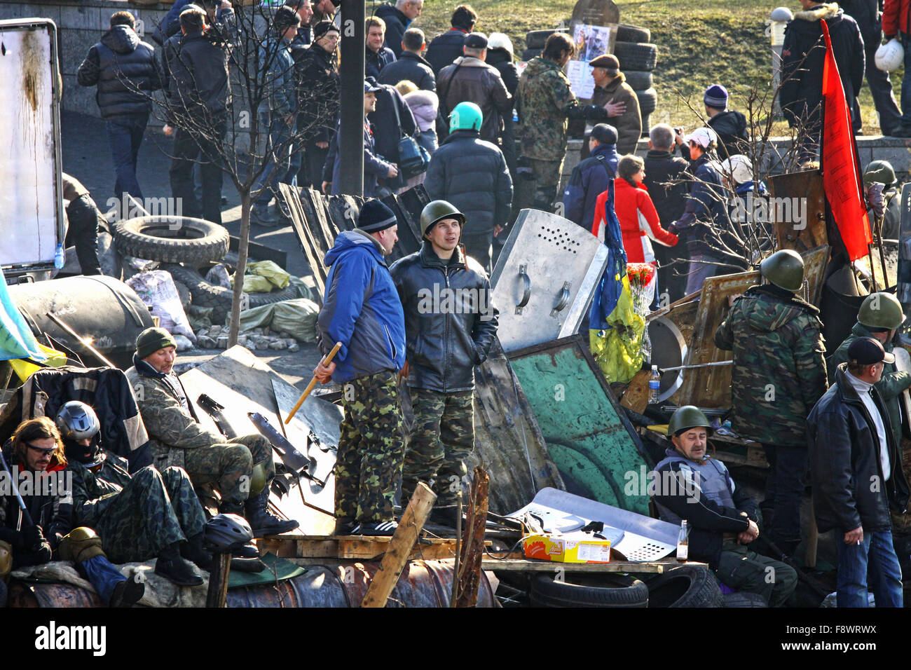 KYIV, UKRAINE - FEBRUARY 21, 2014: Protesters take a rest on barricades ...
