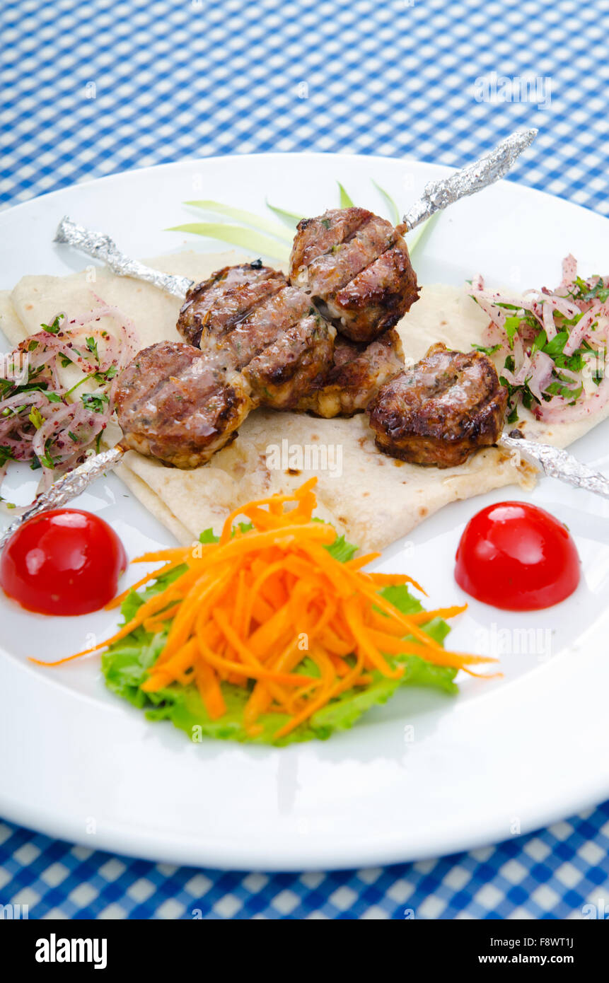 Meat cuisine - kebab served in plate Stock Photo - Alamy
