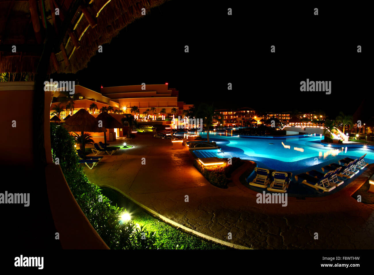 a luxury all inclusive beach resort at night Stock Photo - Alamy
