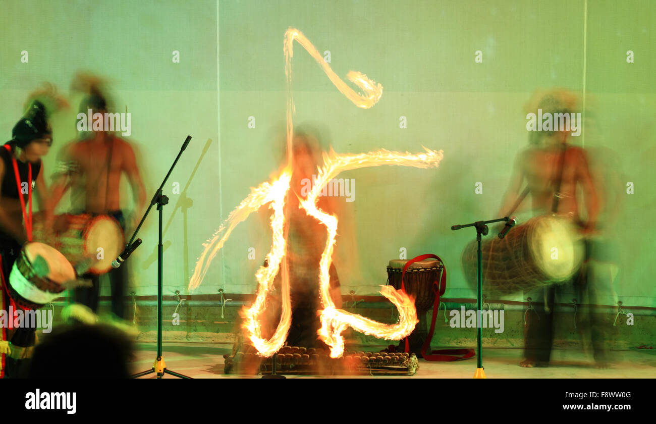 A fire show performed on stage Stock Photo - Alamy