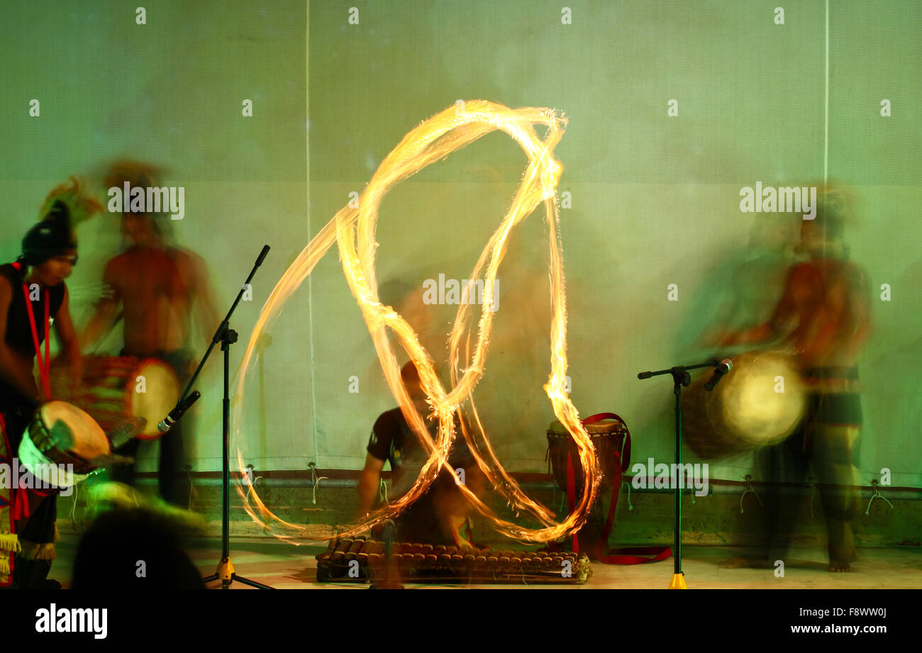 A fire show performed on stage Stock Photo - Alamy