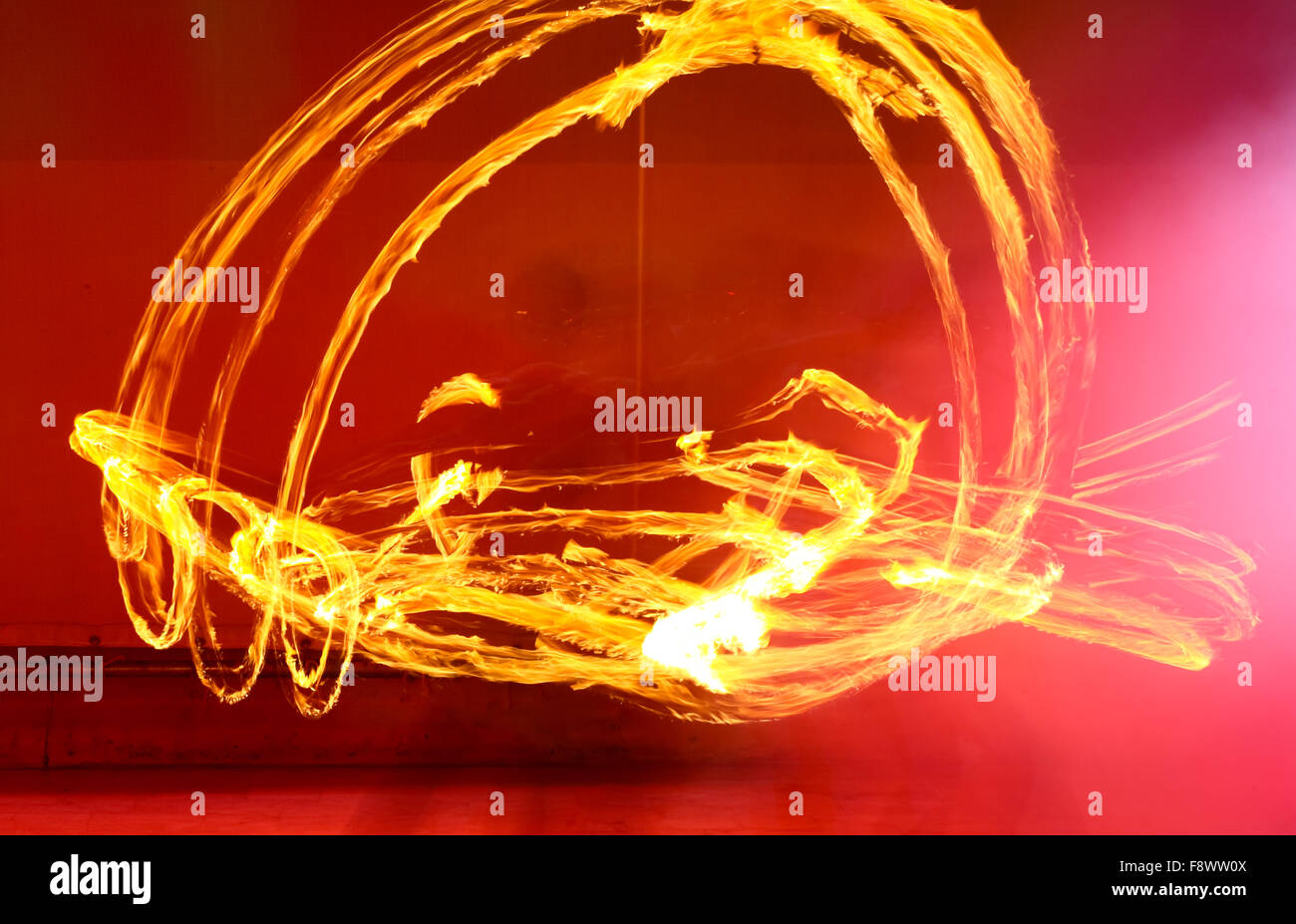 A fire show performed on stage Stock Photo - Alamy