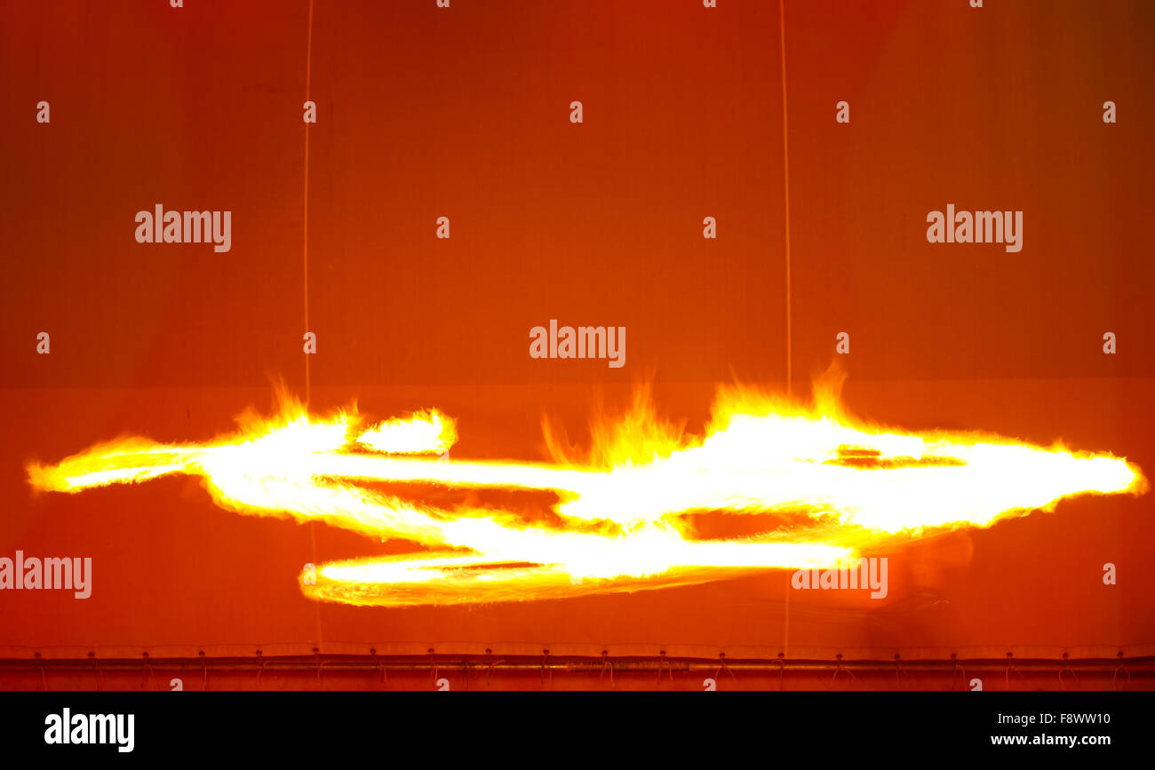 A fire show performed on stage Stock Photo - Alamy