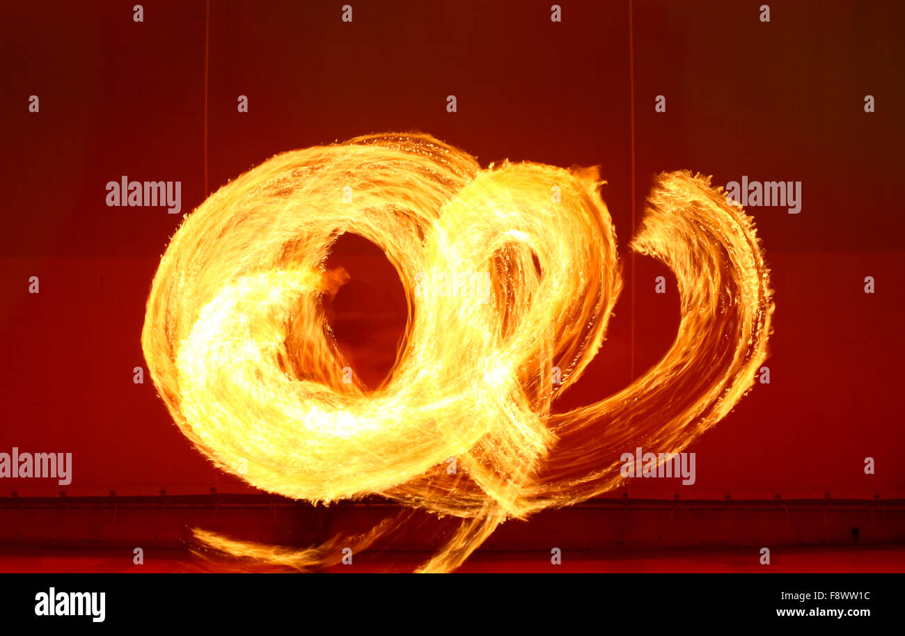 A fire show performed on stage Stock Photo - Alamy