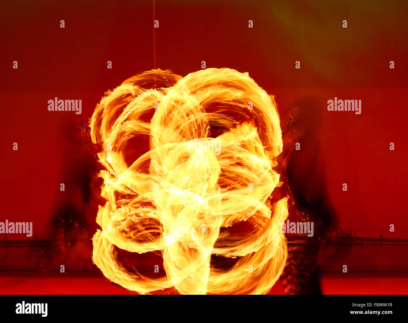 A fire show performed on stage Stock Photo - Alamy