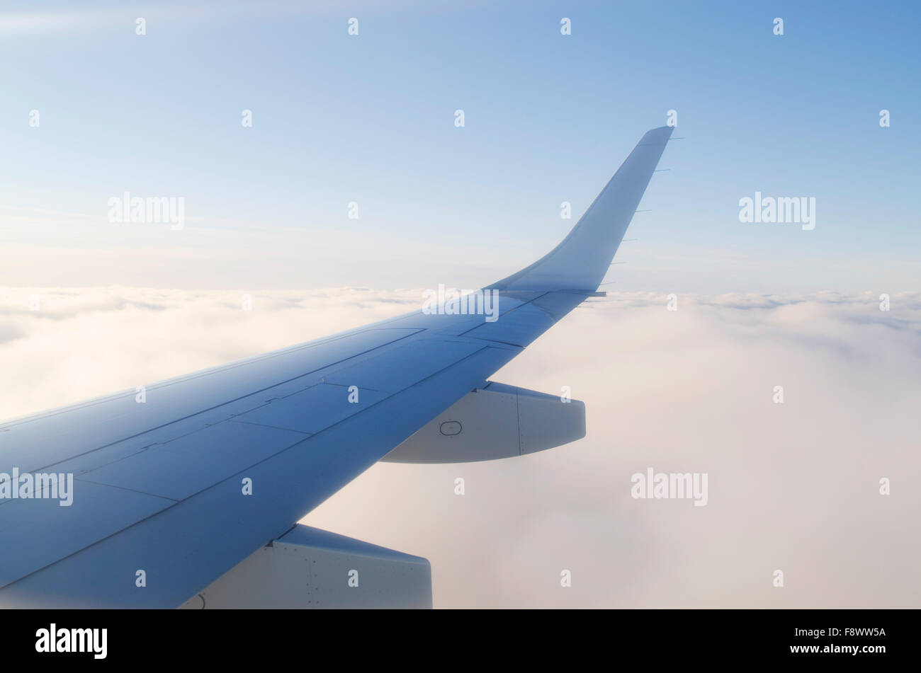 Wing of airplane from window Stock Photo - Alamy