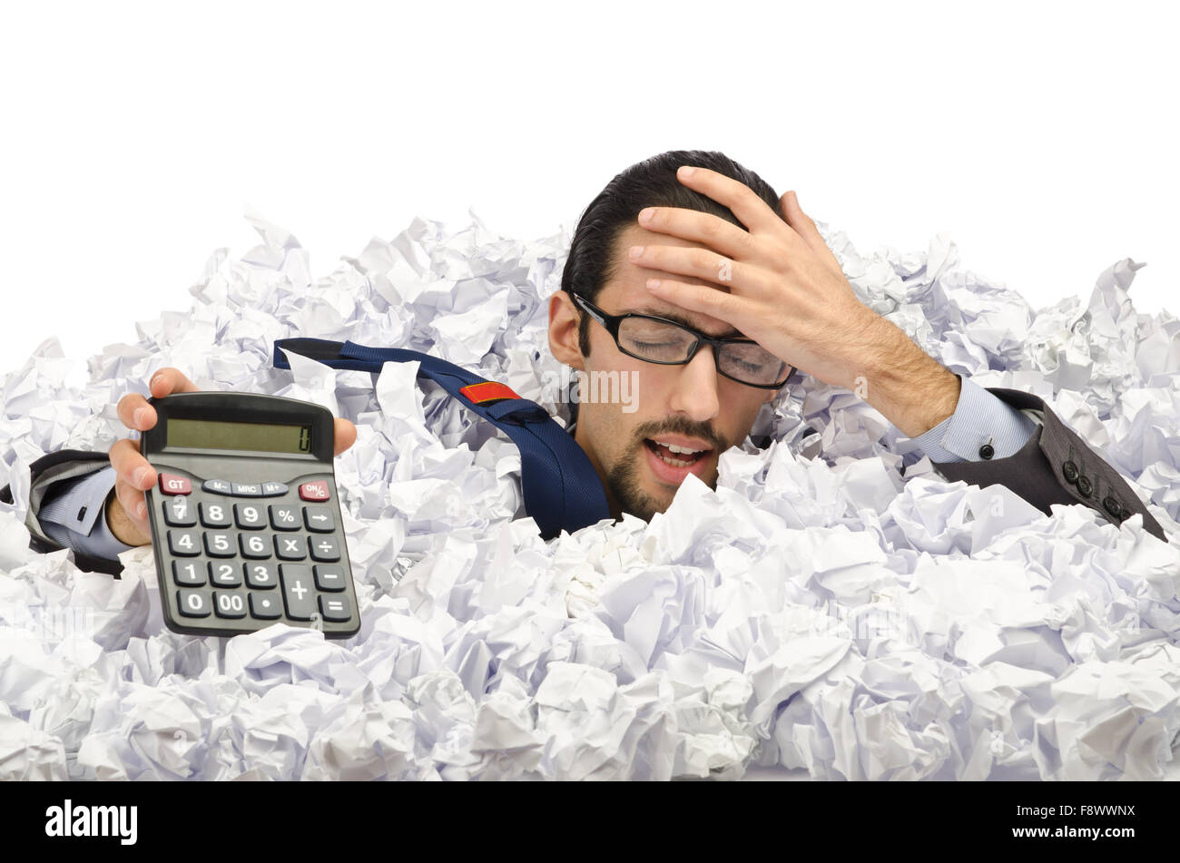 Man with lots of waste paper Stock Photo - Alamy