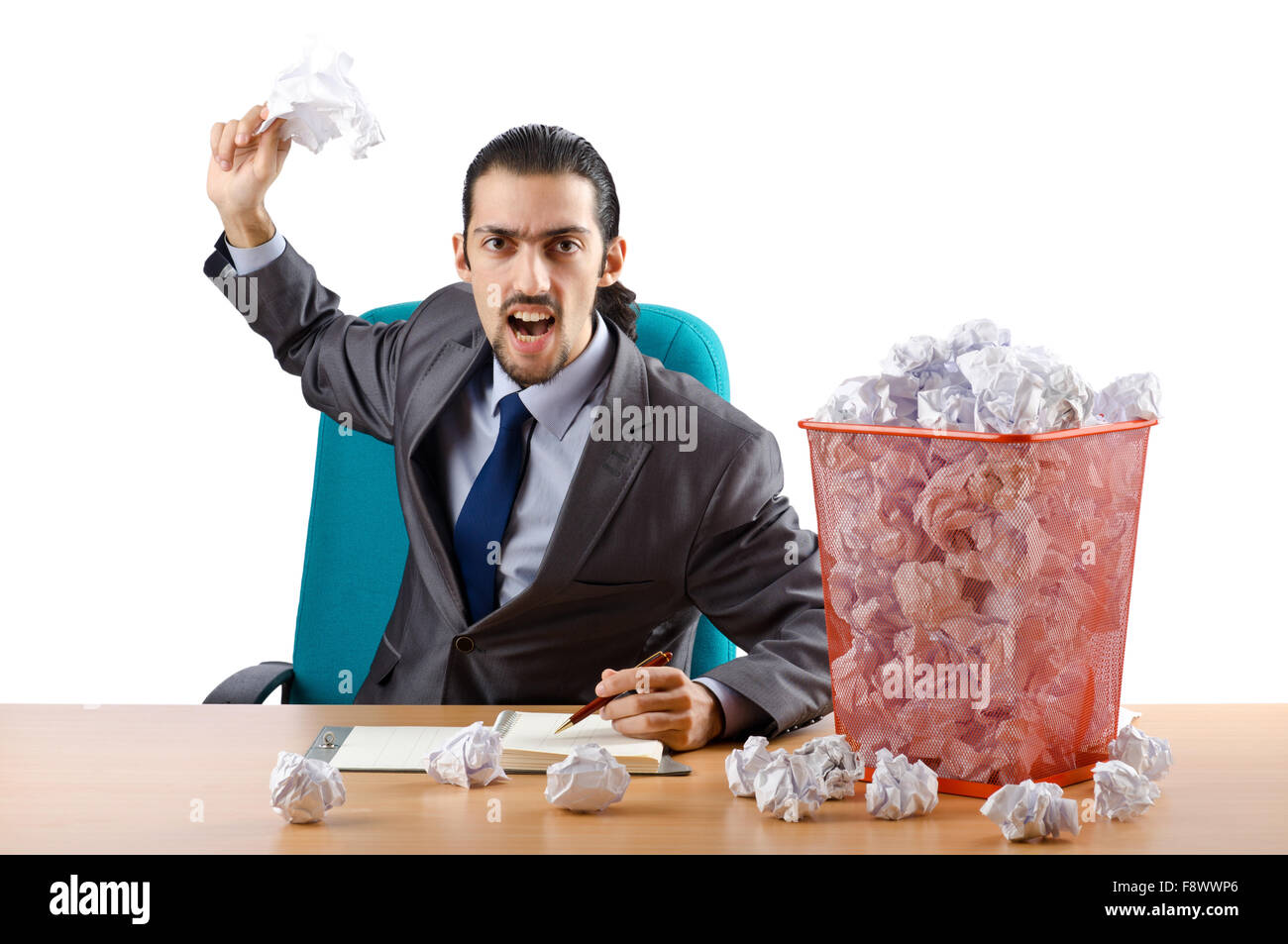 Man with lots of wasted paper Stock Photo - Alamy