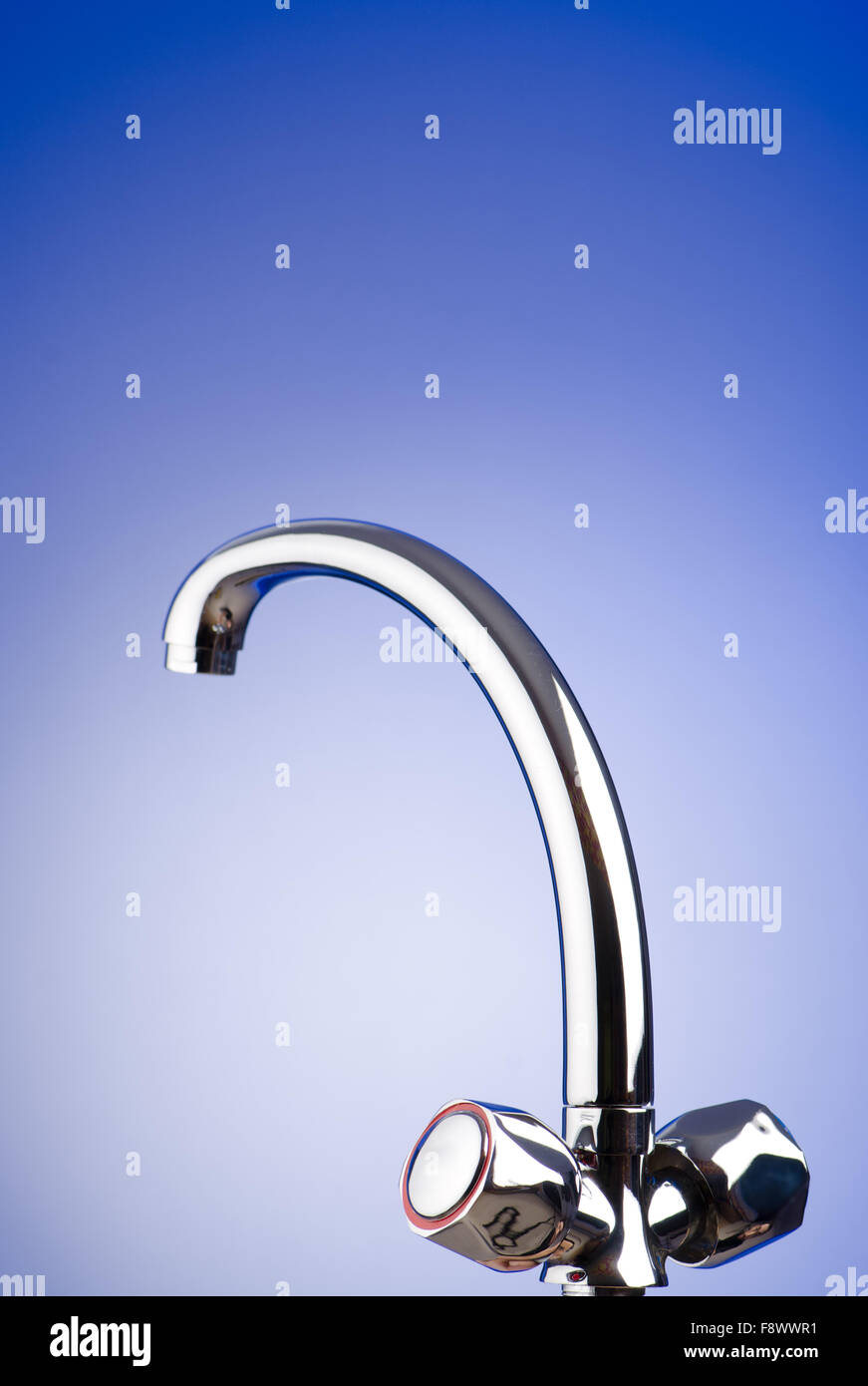 Shiny tap on the gradient Stock Photo - Alamy