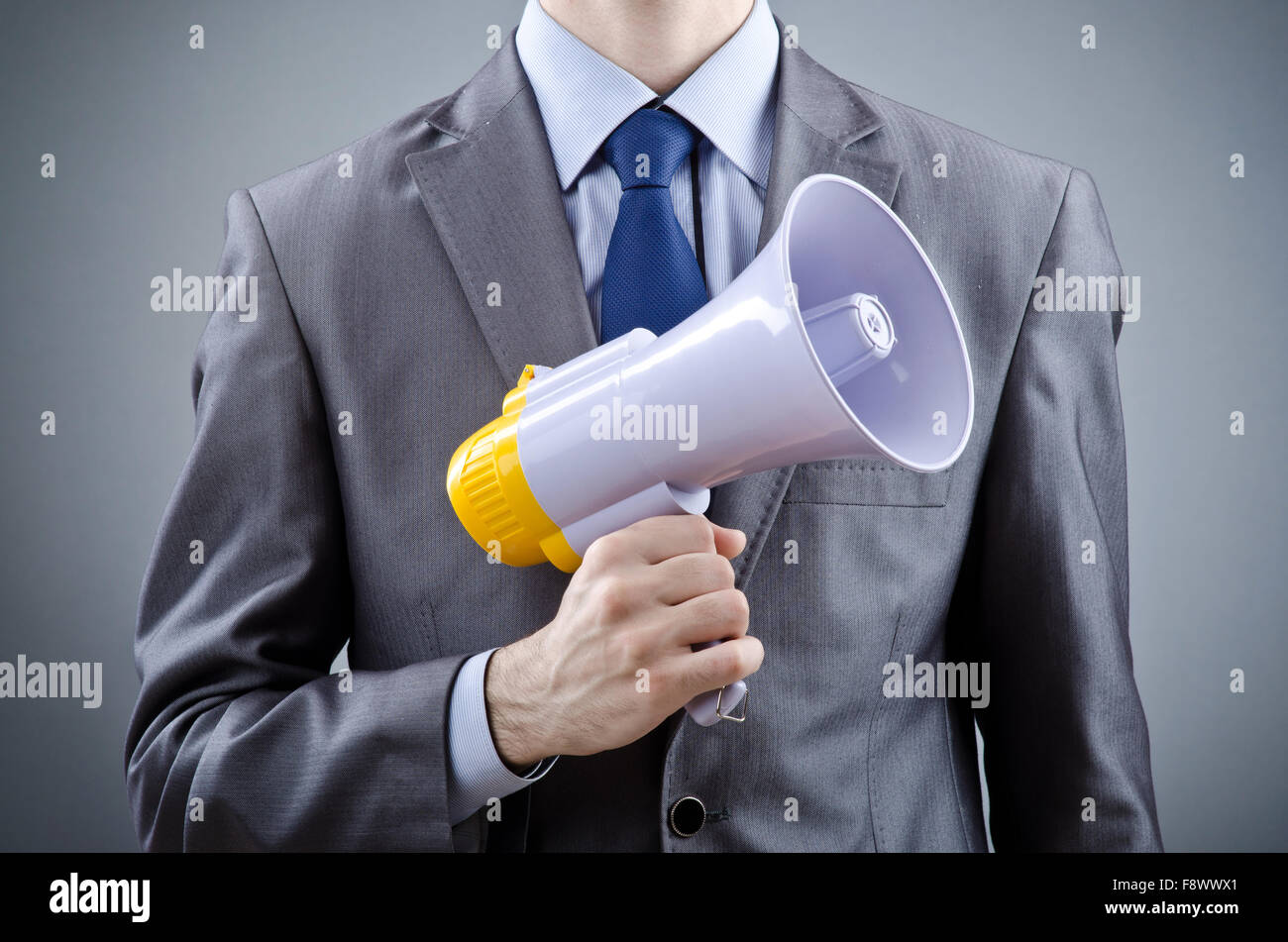 Man shouting and yelling with loudspeaker Stock Photo - Alamy