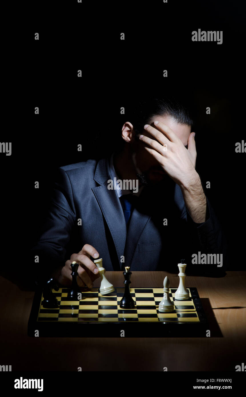 Chess player playing his game Stock Photo - Alamy