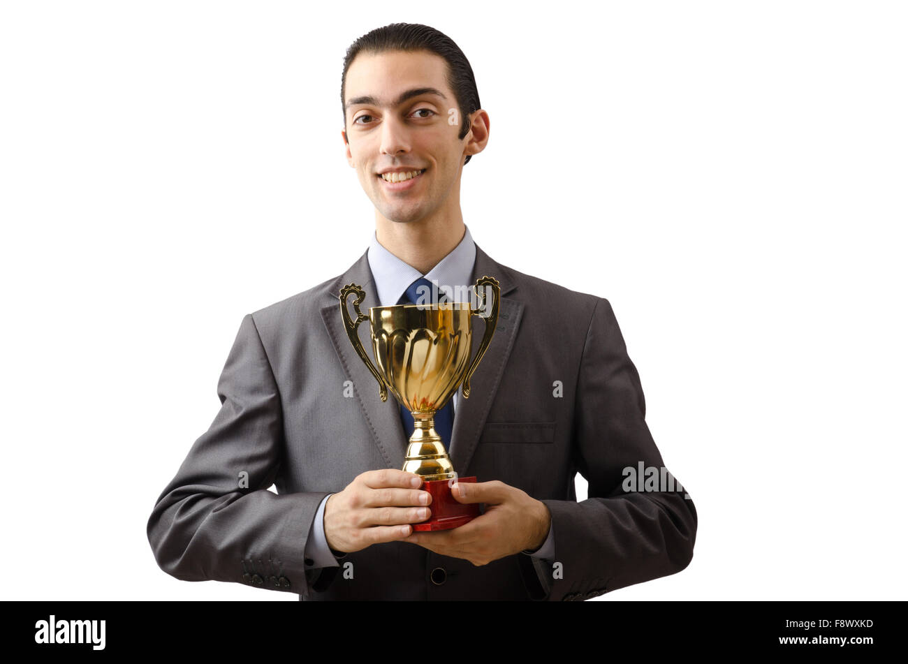 Golden trophy is being awarded to the winner hi-res stock photography ...